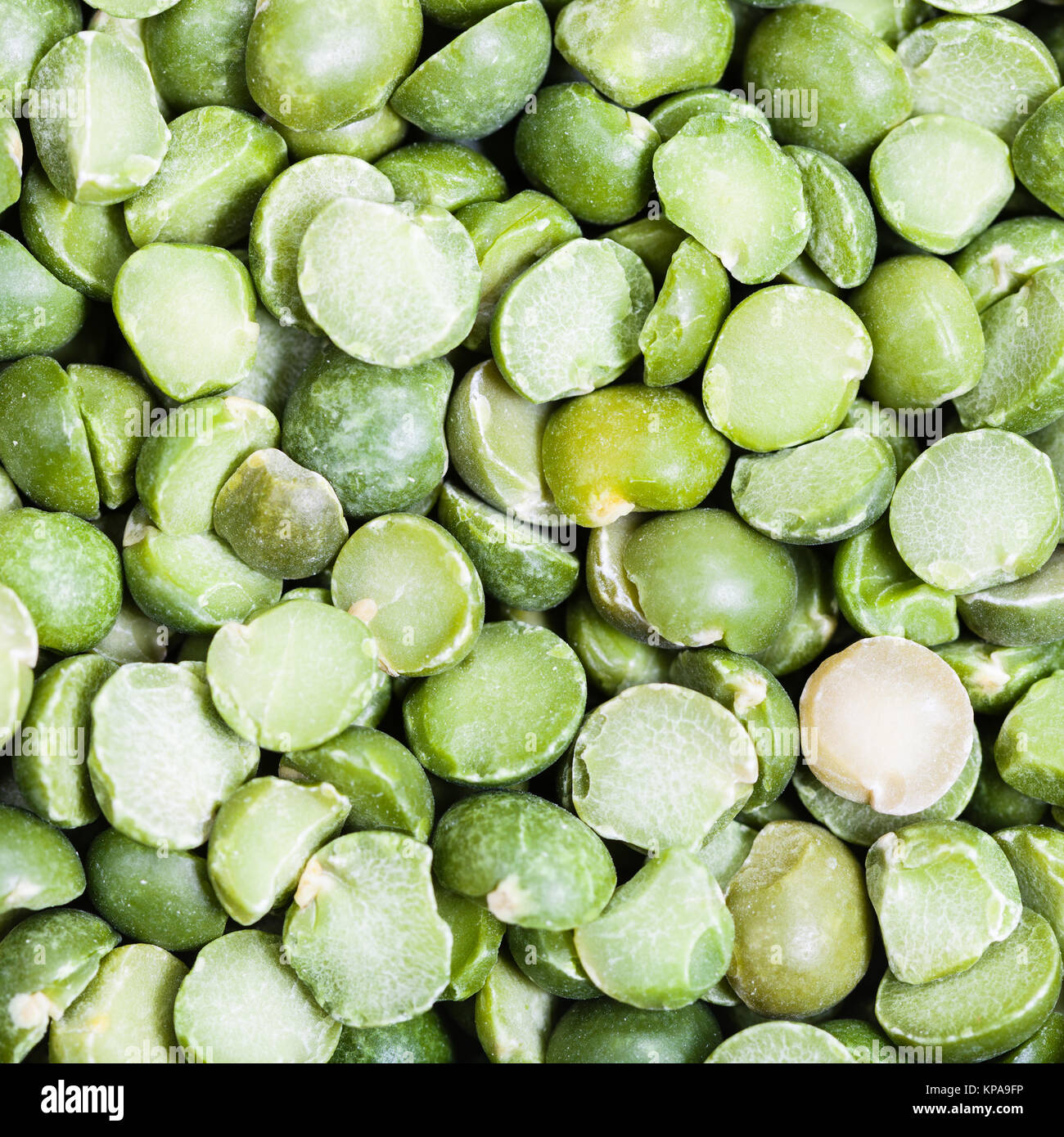 uncooked green split peas Stock Photo - Alamy