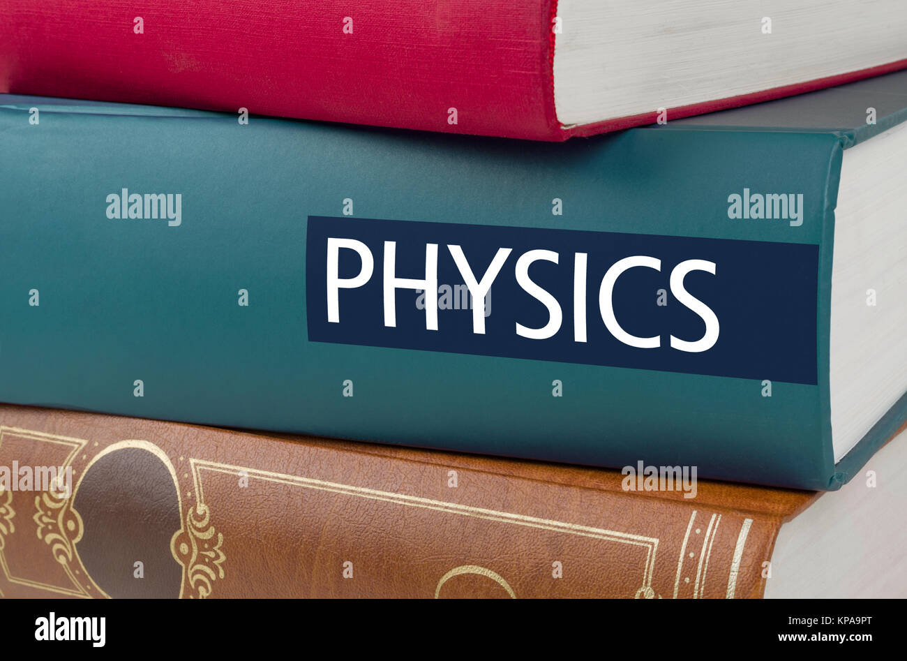 A book with the title Physics written on the spine Stock Photo - Alamy
