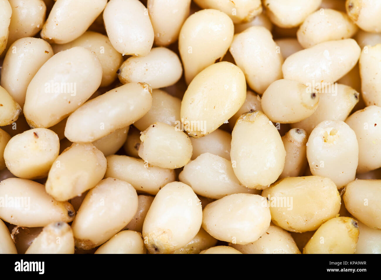 peeled pine seeds close up Stock Photo - Alamy
