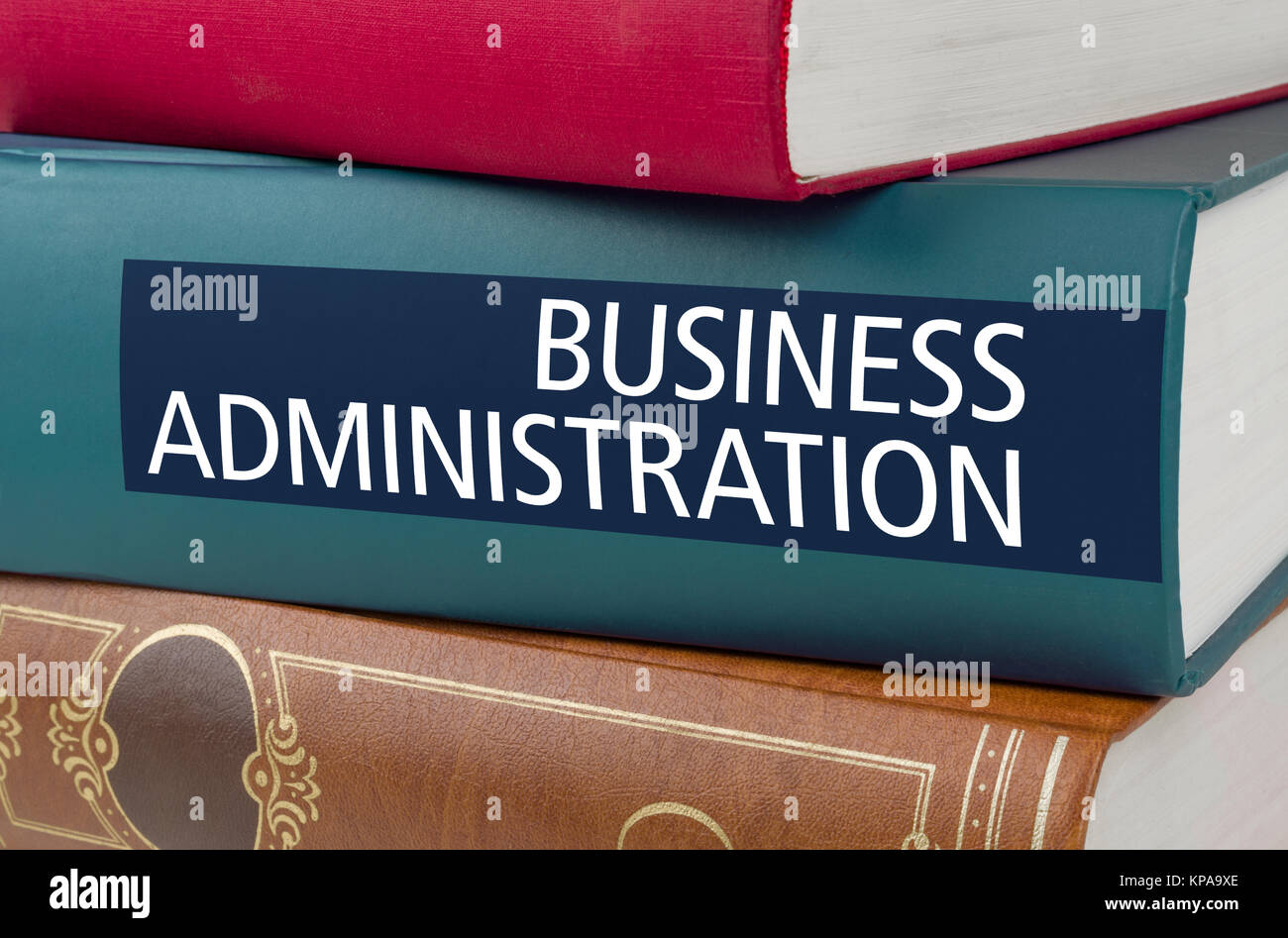 A book with the title Business Administration written on the spine ...