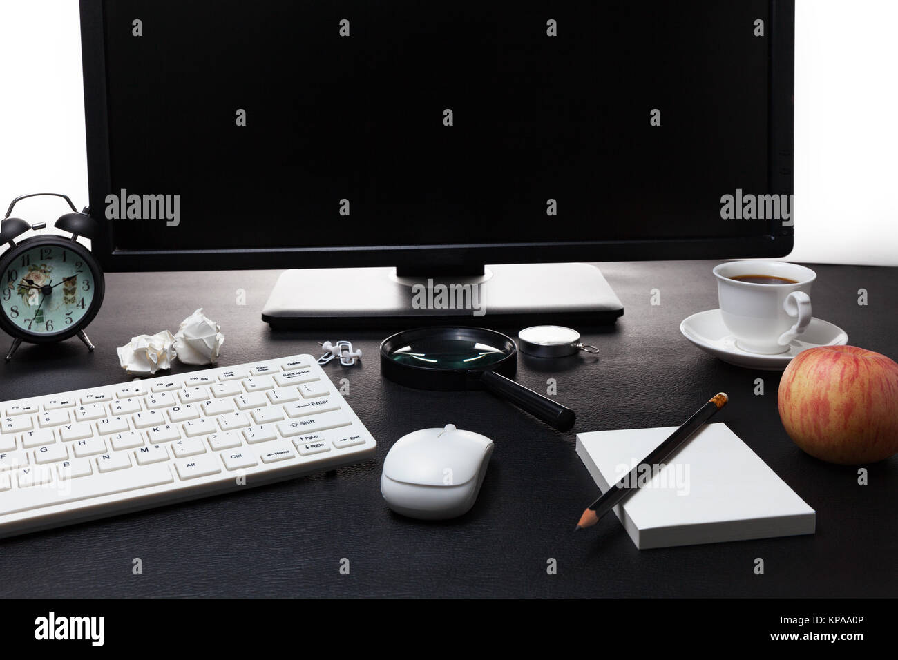 Office desk with the PC and business objects on black table Stock Photo ...