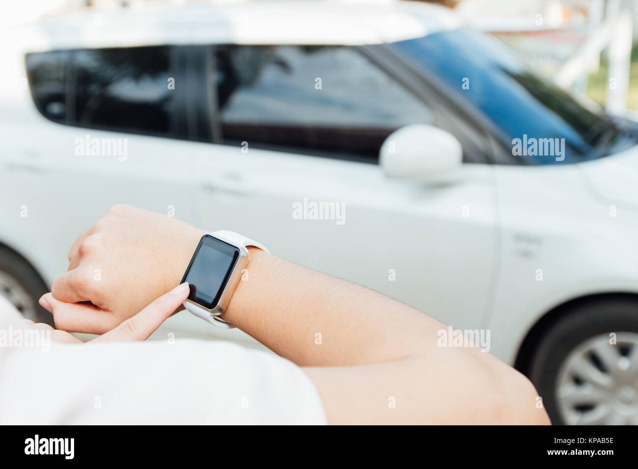 female hand touching on smartwatch Stock Photo - Alamy