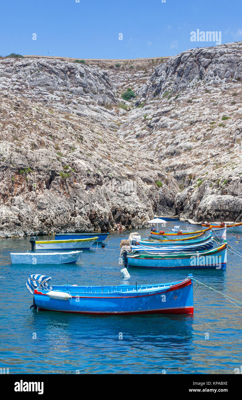Small tourist boats moored in the Wied iz-Zurrieq harbor near the Blue ...