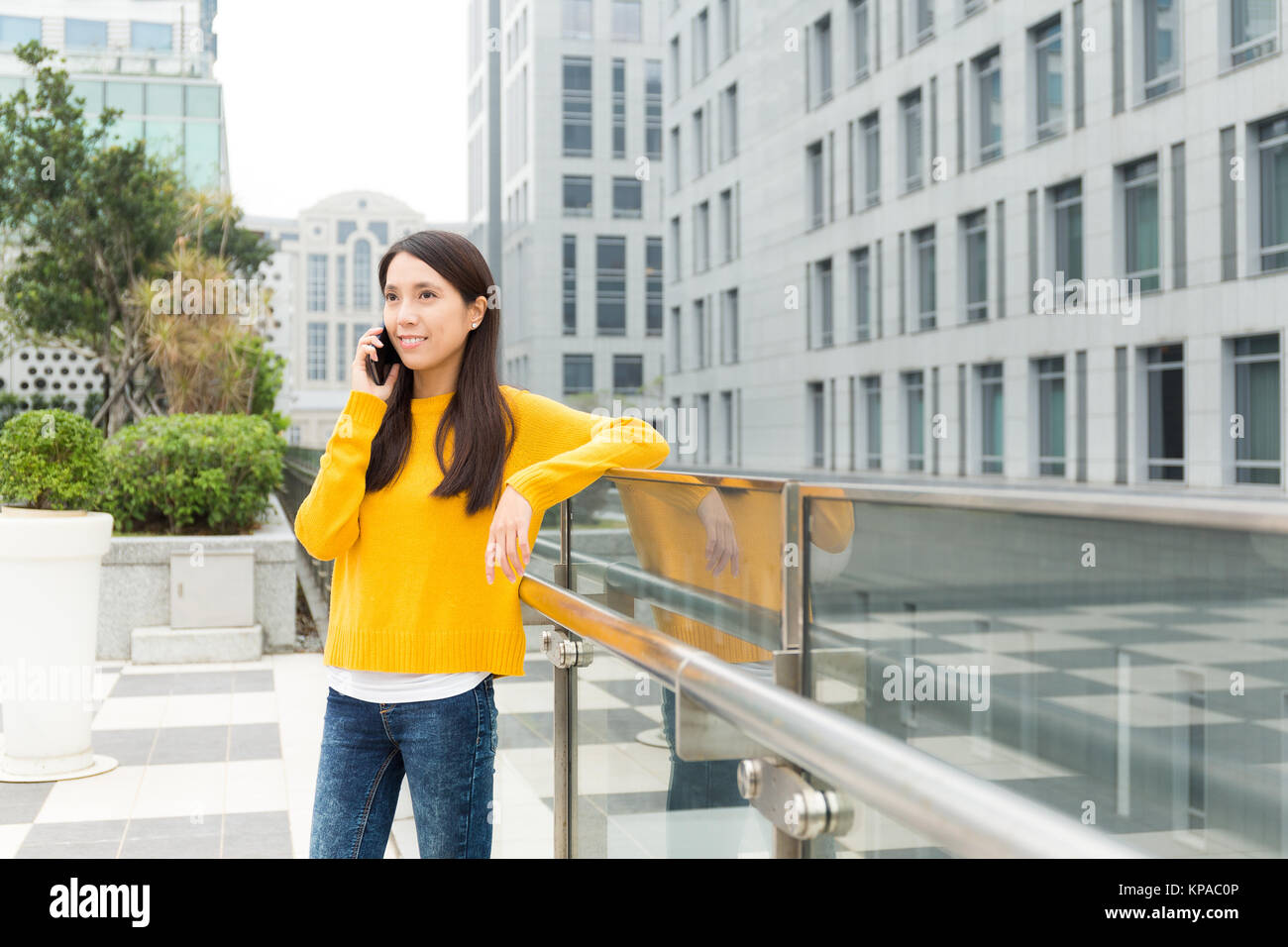 Woman make a call at outdoor Stock Photo - Alamy
