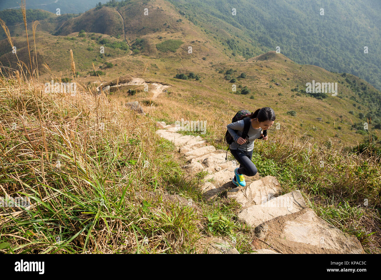 Woman go hiking Stock Photo - Alamy