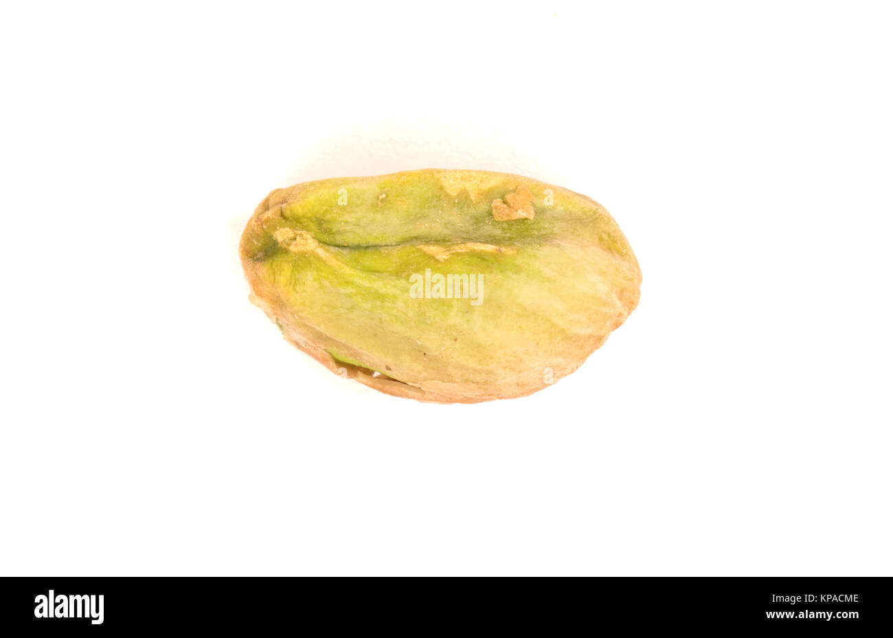 Macro view of single pistachio nut kernel Stock Photo - Alamy