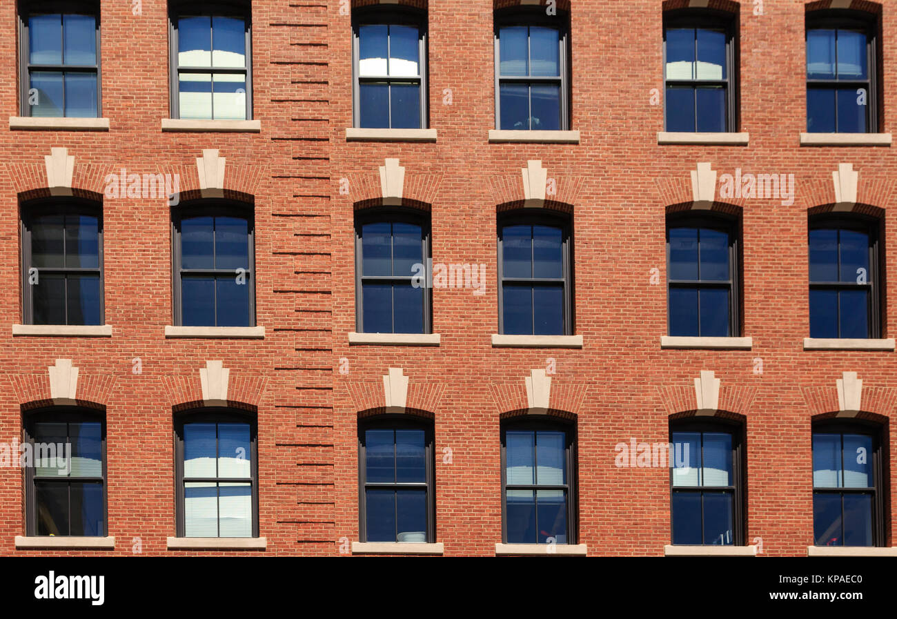 Many Archstones Over Windows in Traditional Brick Building Stock Photo ...