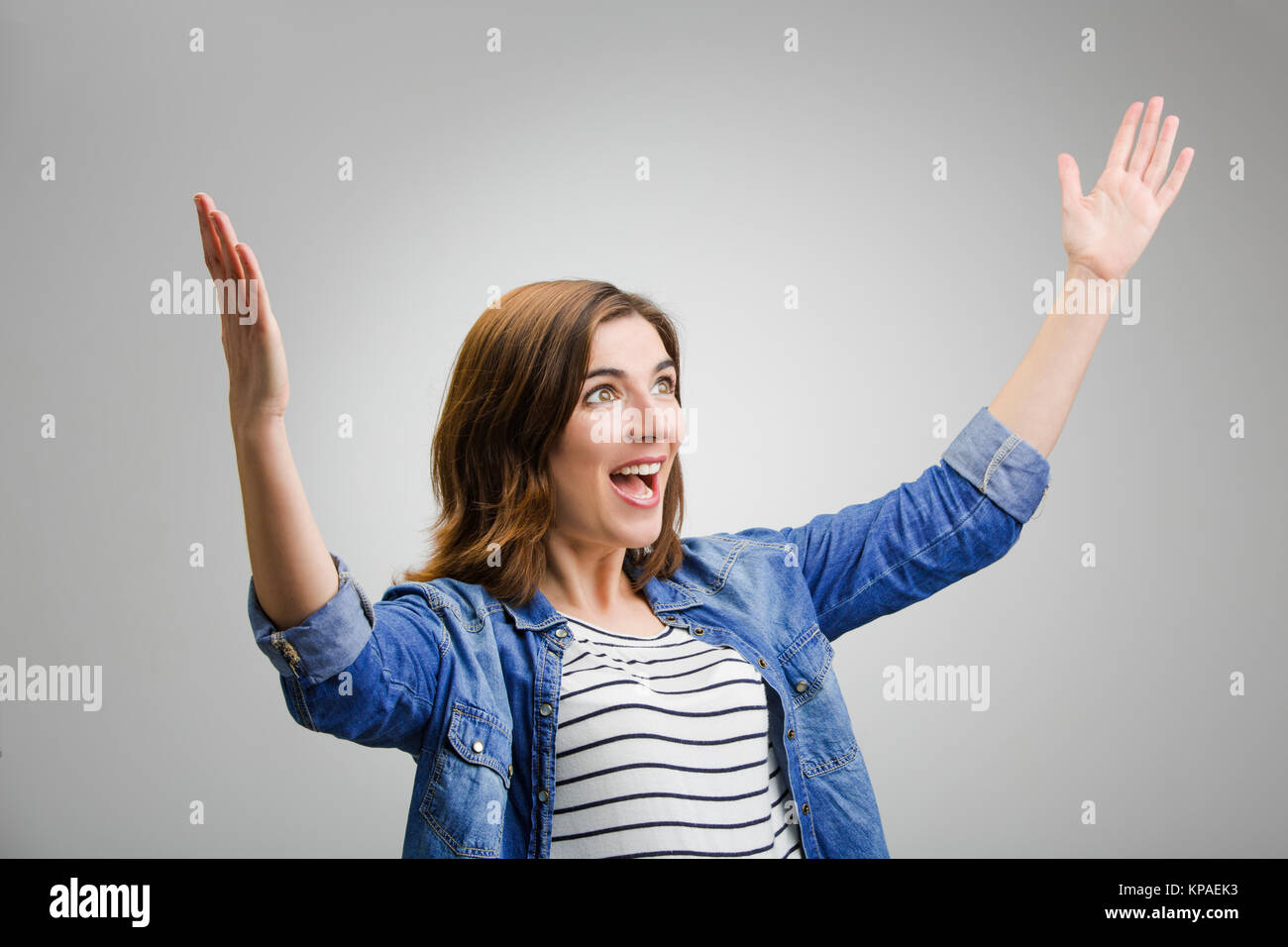 Joyful young woman celebrates win hi-res stock photography and images ...