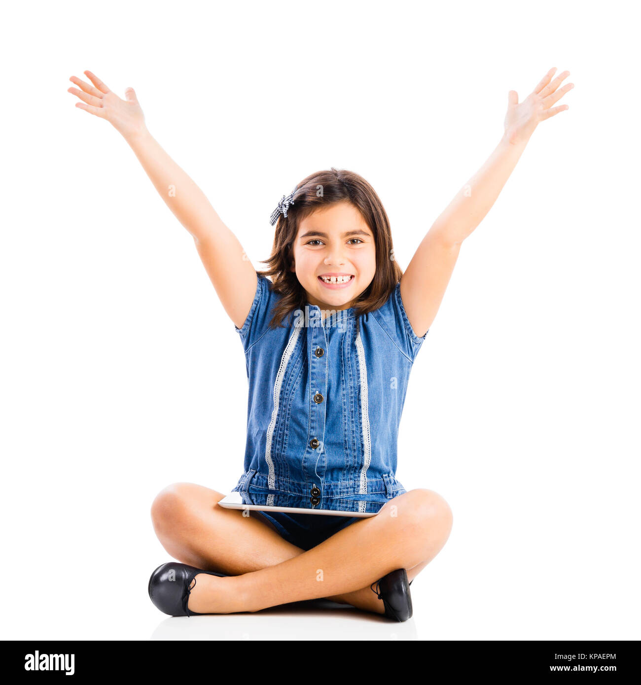 Young girl using a tablet Stock Photo - Alamy