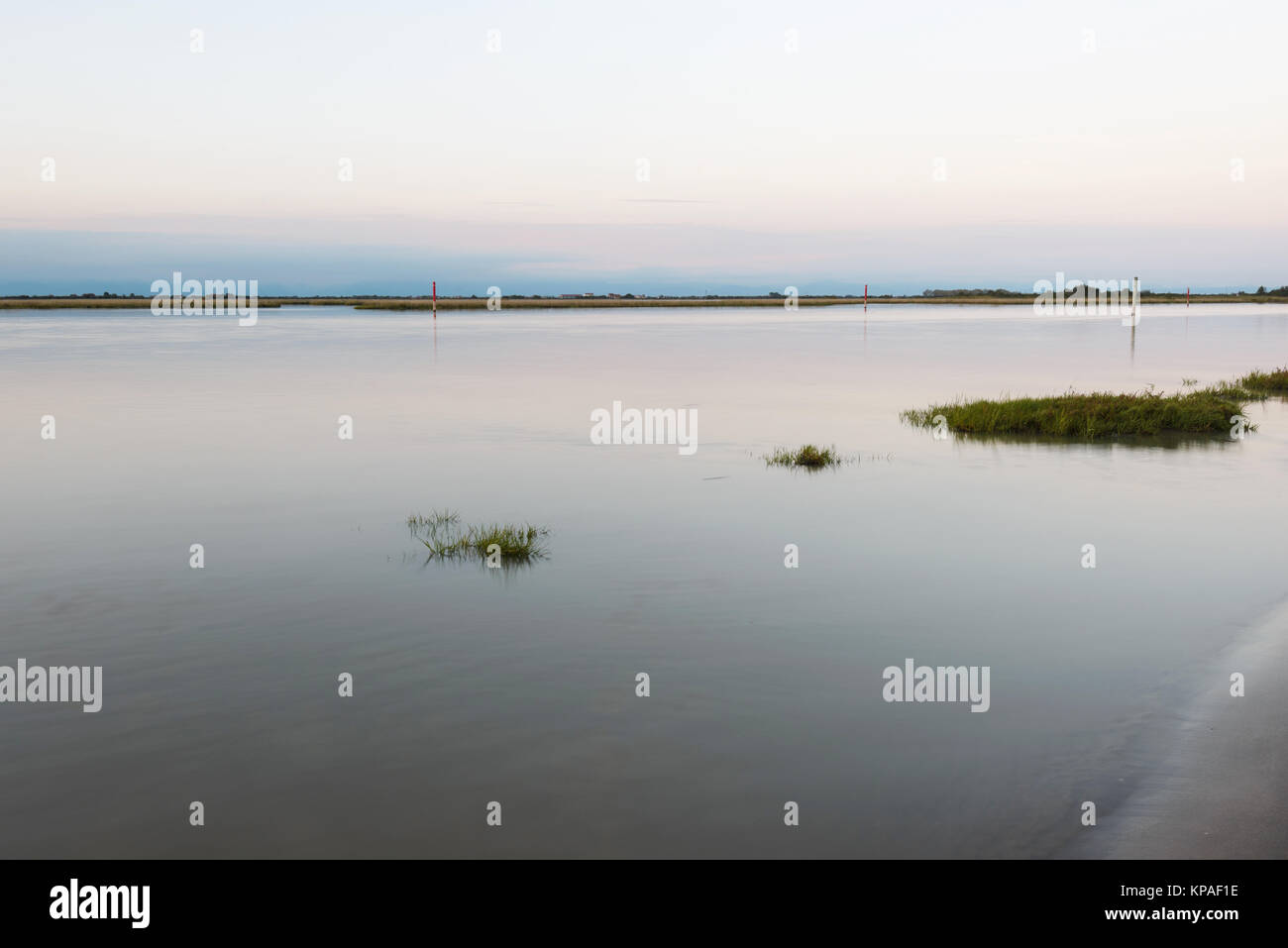 sunset landscape on the lagoon at Bibione pineda Stock Photo - Alamy