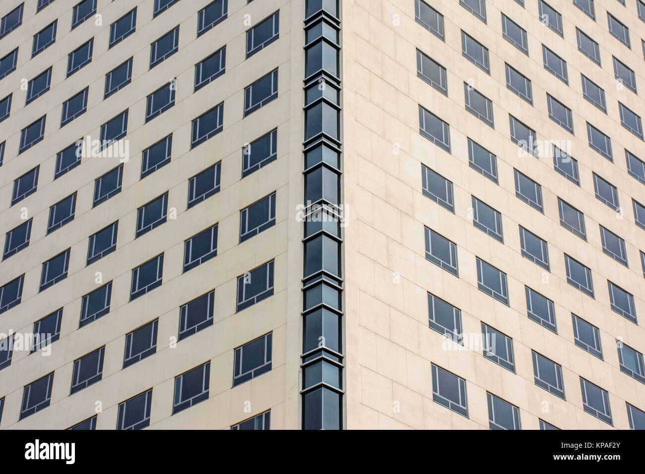 symmetrical patterns wall of the high building Stock Photo - Alamy