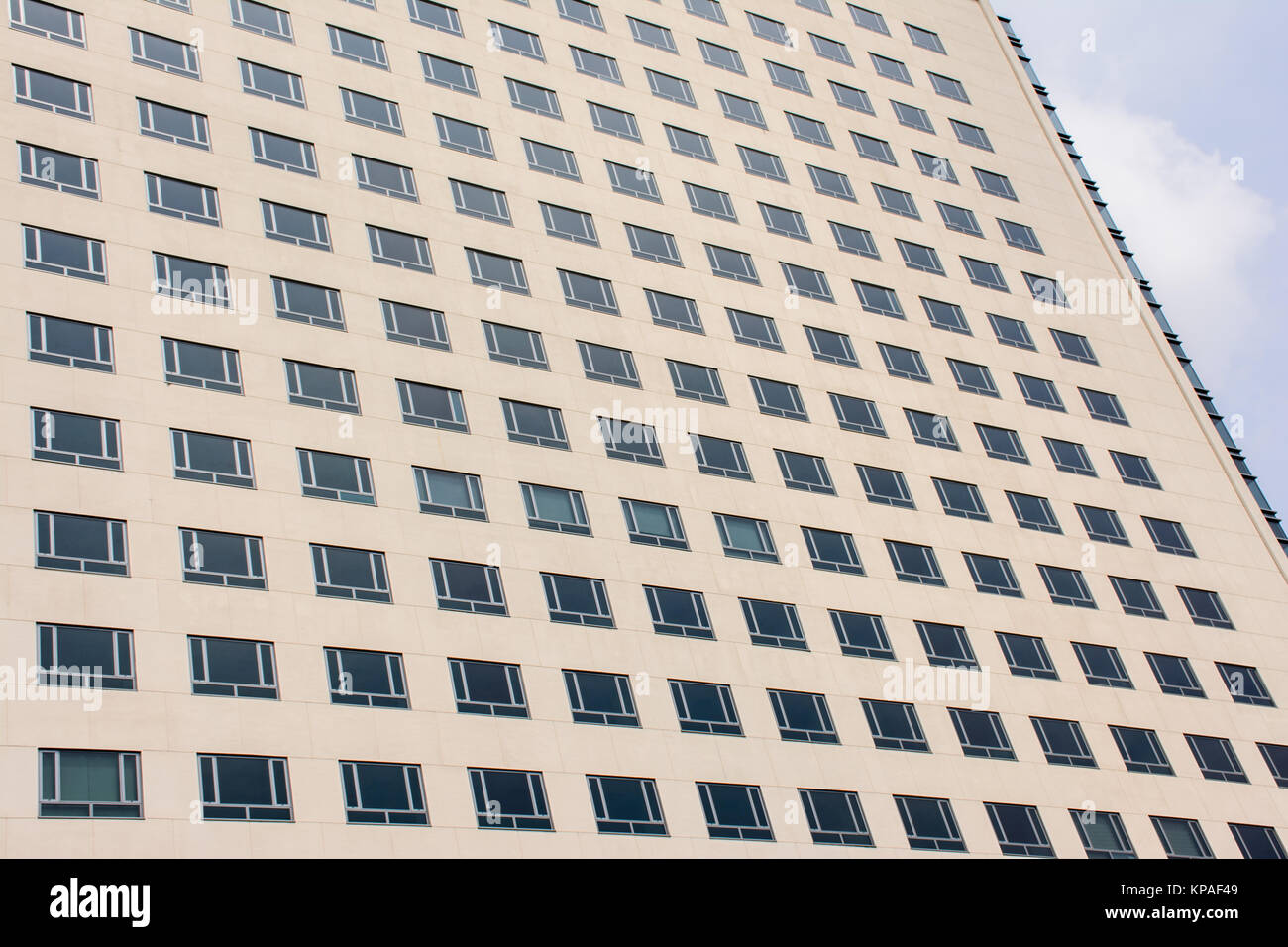 symmetrical patterns wall of the high building Stock Photo - Alamy