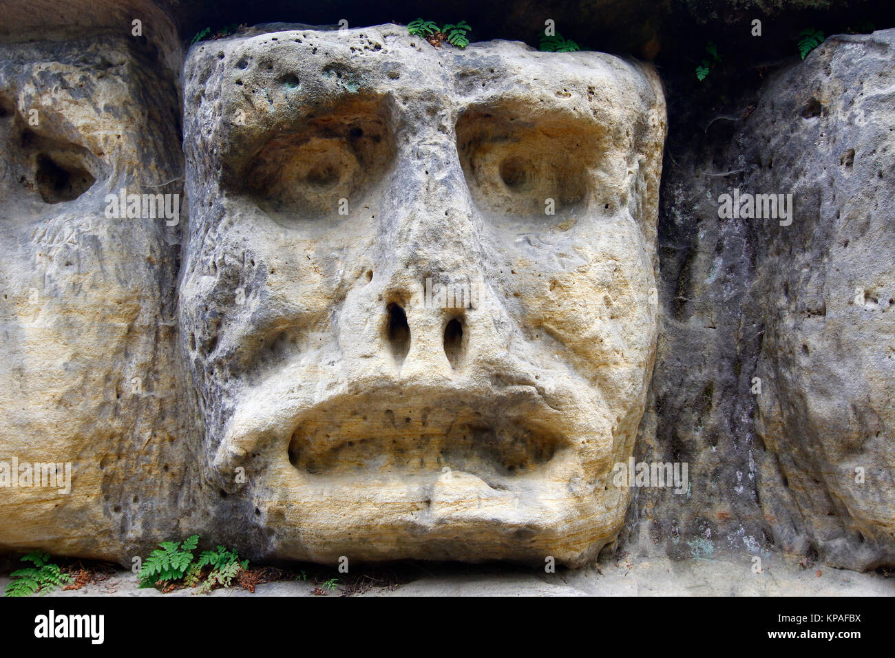 Frightening stone head rock hi-res stock photography and images - Alamy