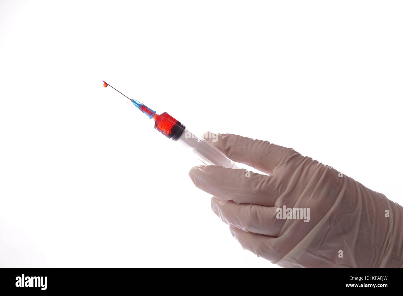 Hand with syringe isolated on white Stock Photo - Alamy