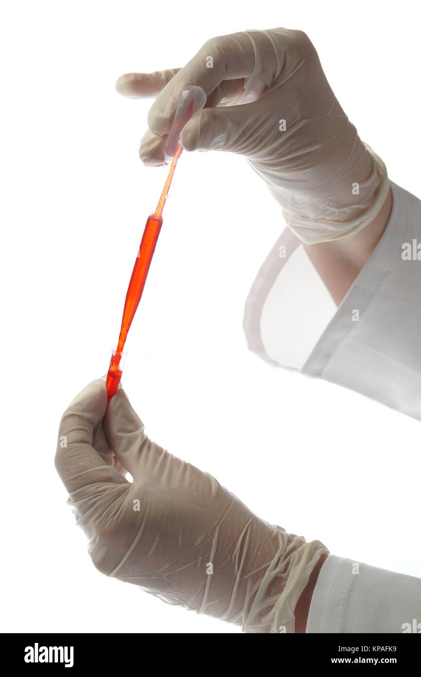 Hand with pipette and testtube isolated on white Stock Photo - Alamy