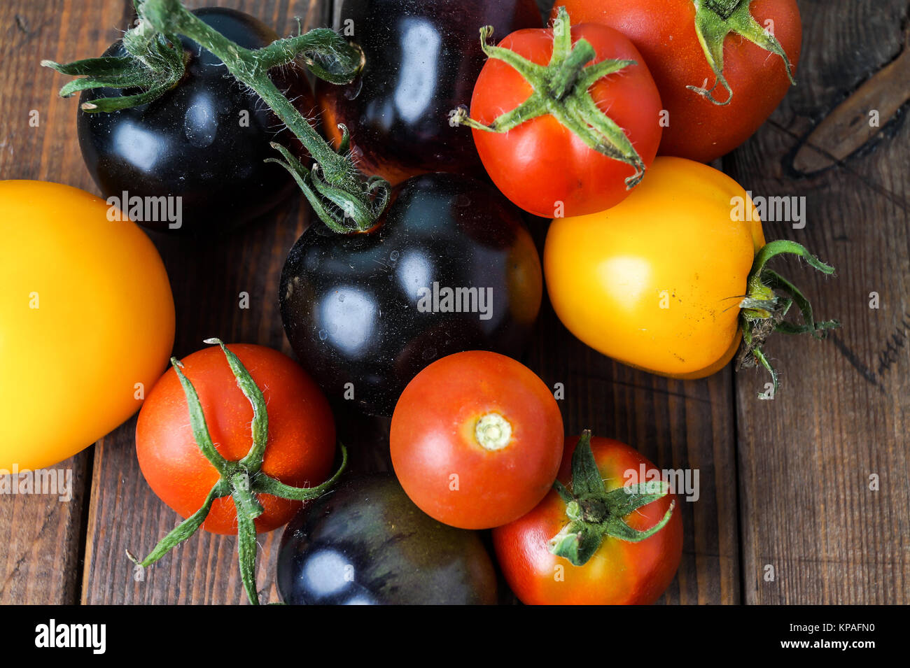 Fresh colorful tomatoes Stock Photo - Alamy
