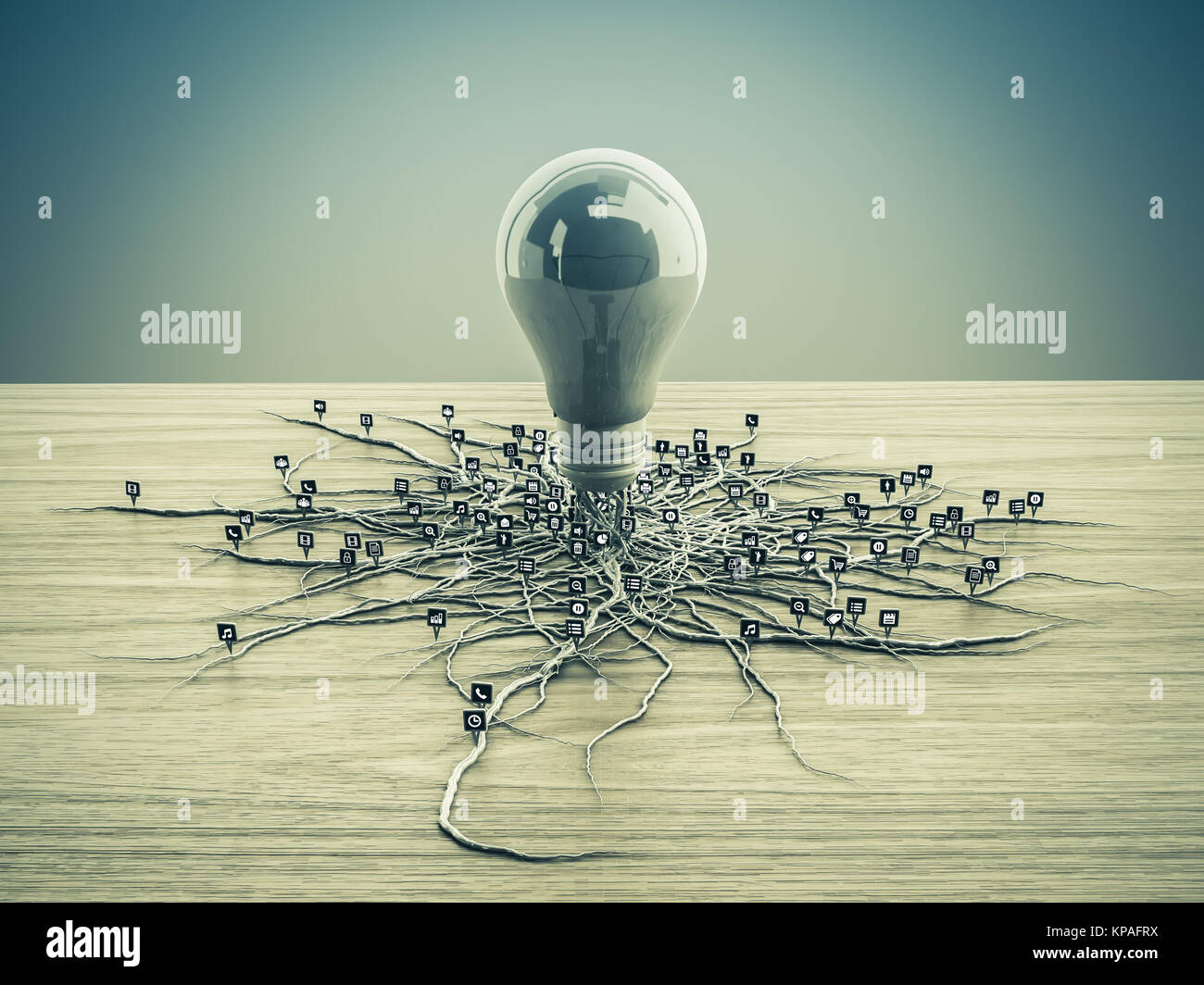 Light bulb with roots and emerged on the icon with roots Stock Photo ...