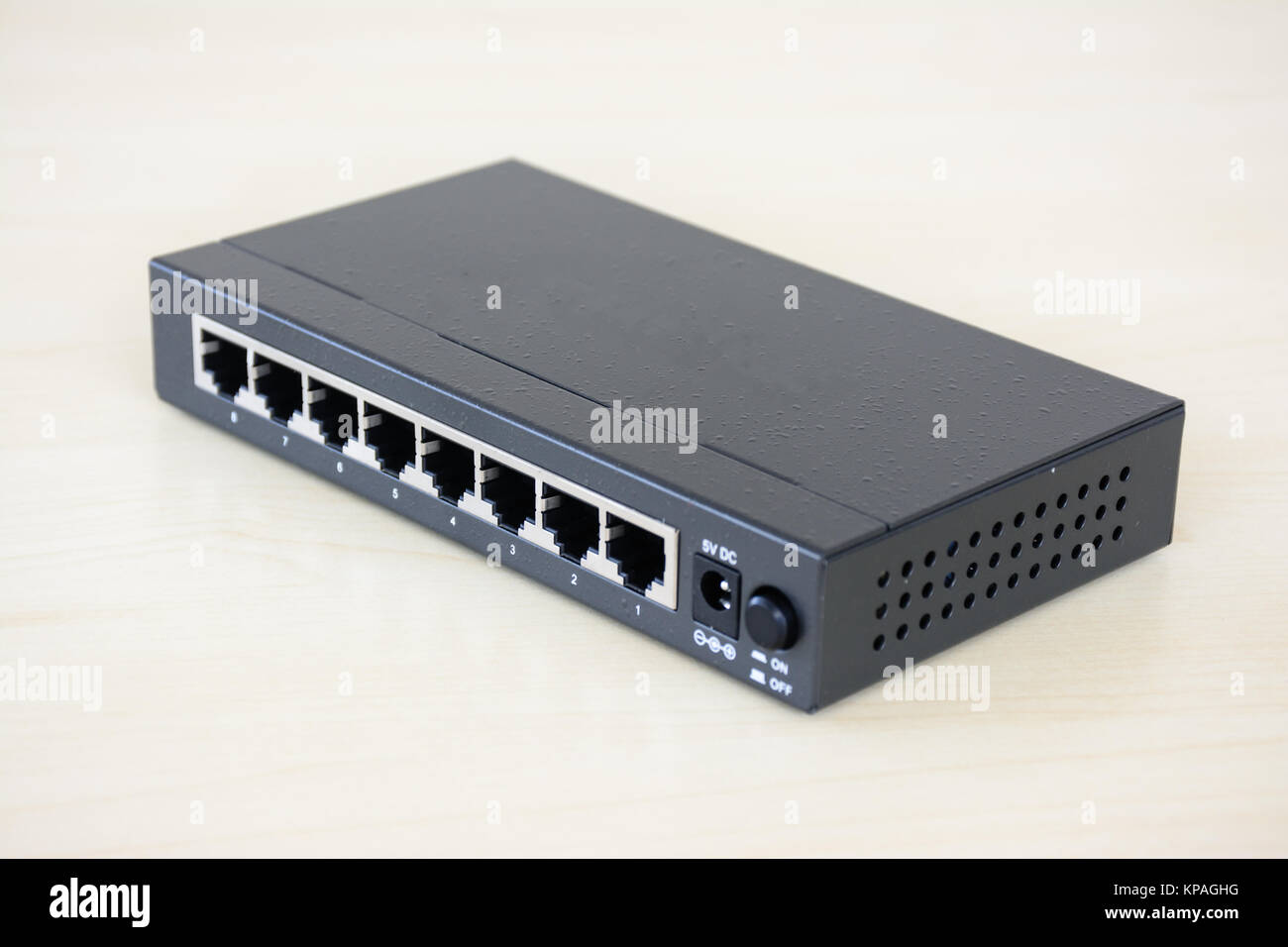 8 ports switch with metallic body, isolated background Stock Photo - Alamy