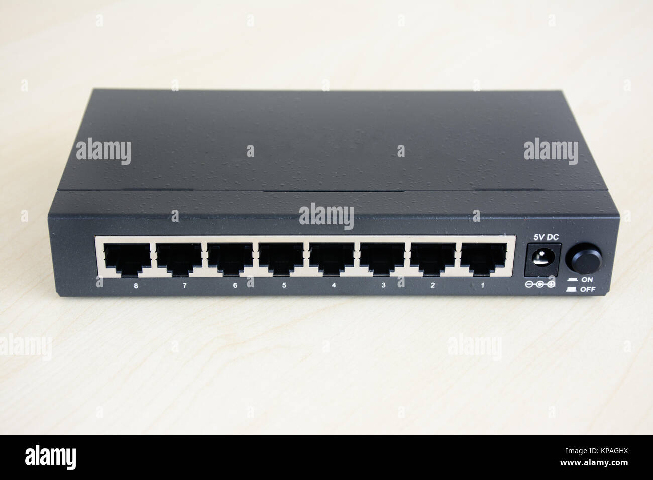 8 ports switch with metallic body, isolated background Stock Photo - Alamy