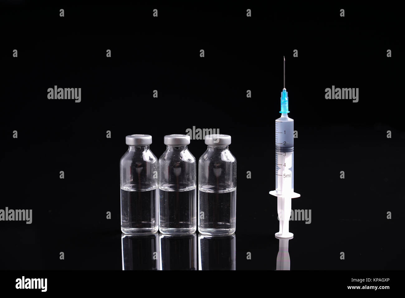 Medical vials and syringe Stock Photo - Alamy