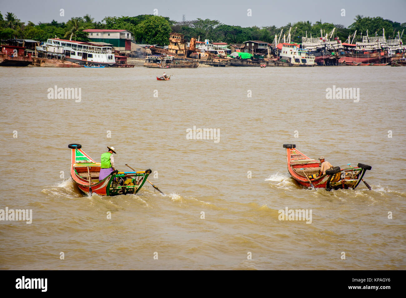 two boats in the Yangon river, they transport between Yangon and Dala ...