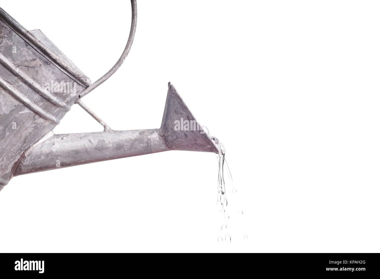 dripping watering can Stock Photo - Alamy