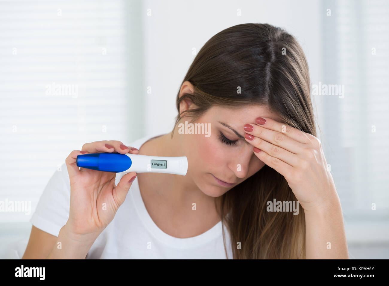 Woman Holding Pregnancy Kit Stock Photo - Alamy
