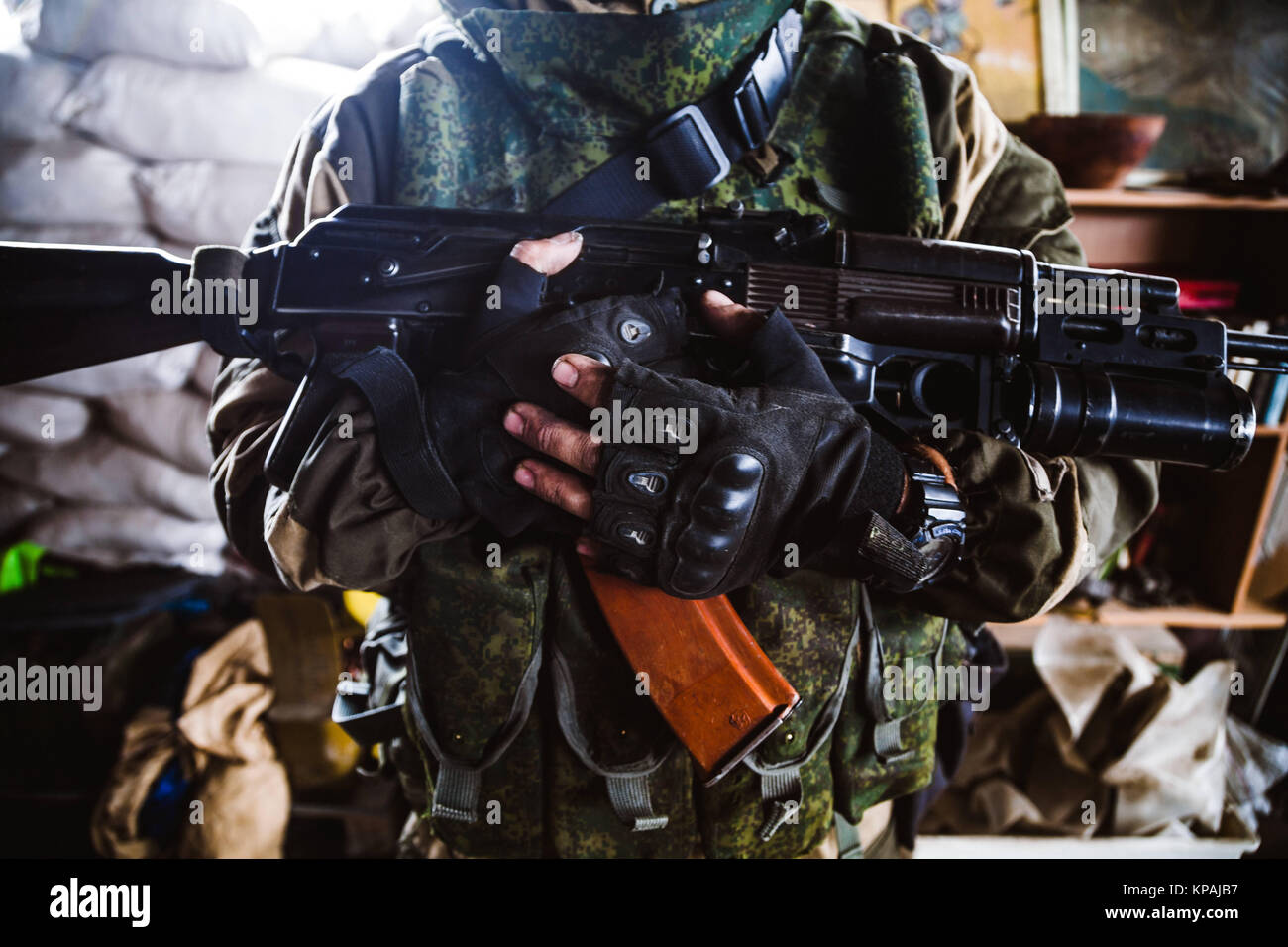 Donetsk, Donbass, Ukraine. 18th Sep, 2016. Soldier holds his AK-47 ...