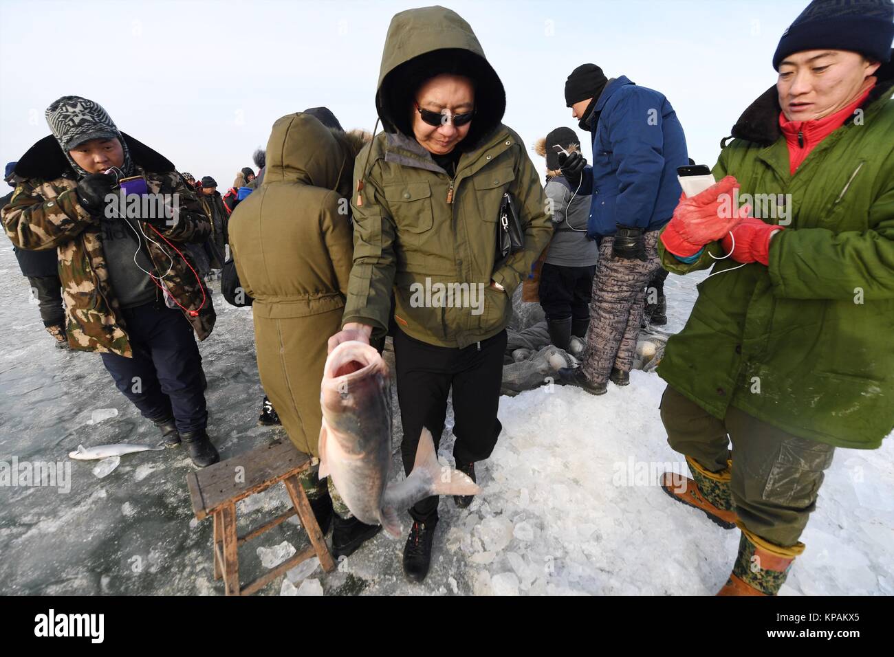 Songyuan, China's Jilin Province. 14th Dec, 2017. A tourist poses for ...