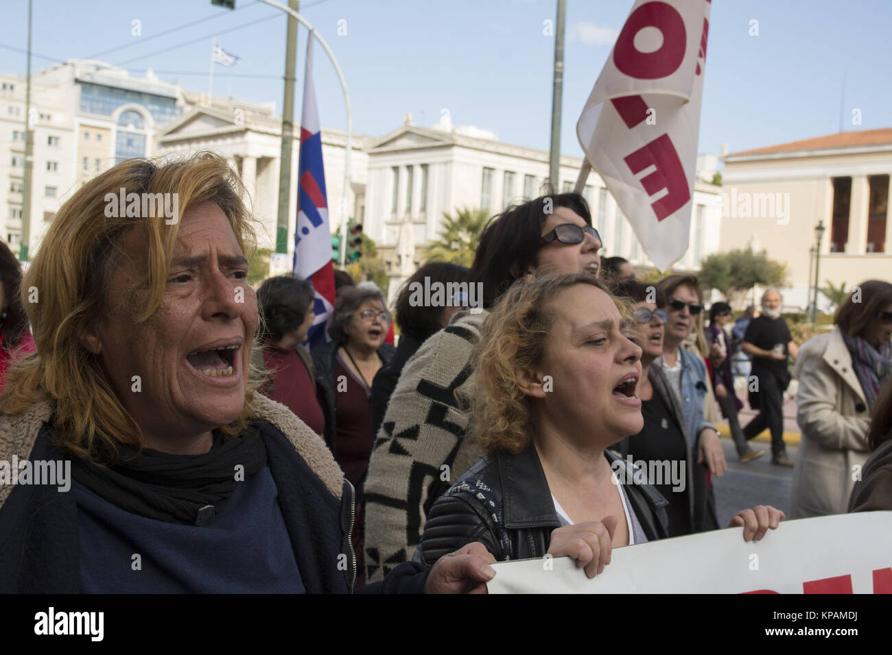 Athens, Greece. 14th Dec, 2017. Strikers march holding banners and ...