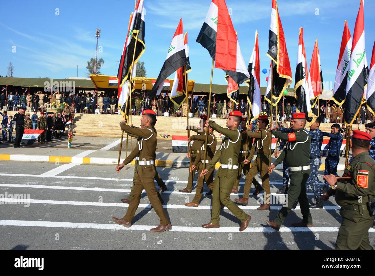 Mosul. 14th Dec, 2017. Iraqi soldiers take part in a parade in Mosul ...