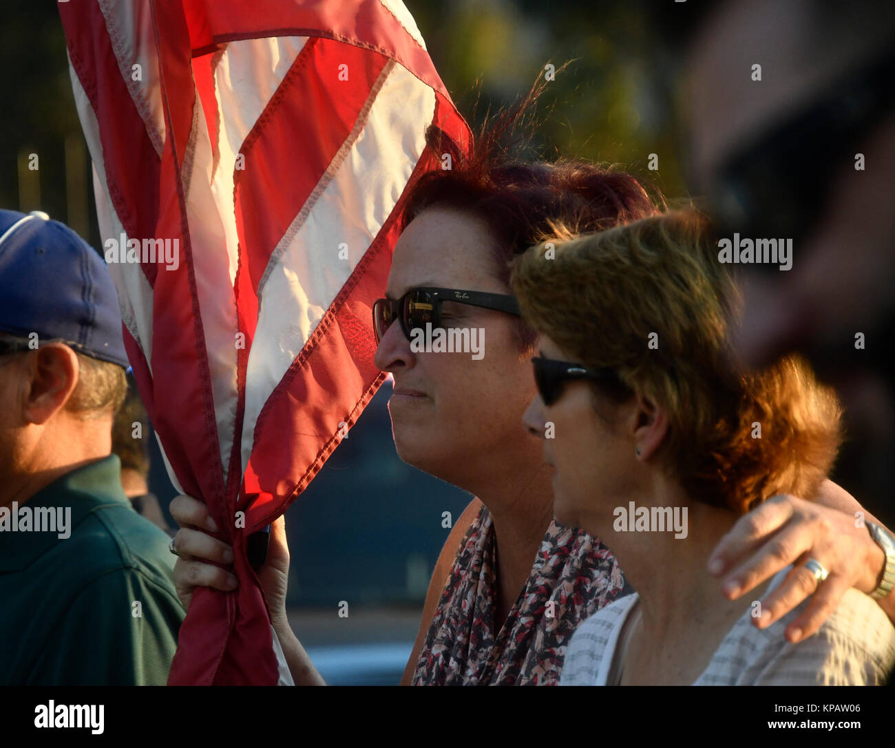 A funeral procession by firefighters and police was done as the people ...