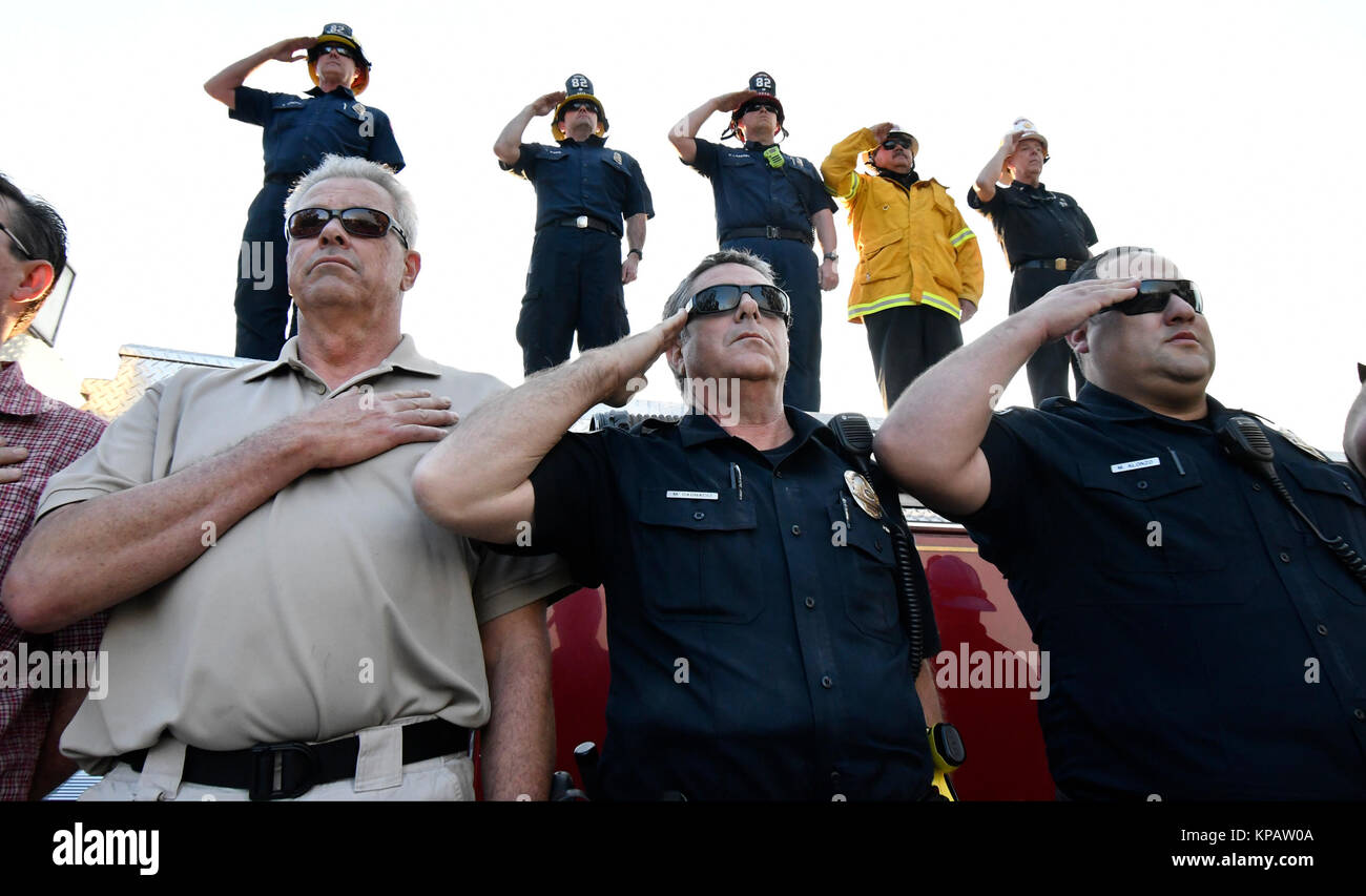 A funeral procession by firefighters and police was done as the people ...