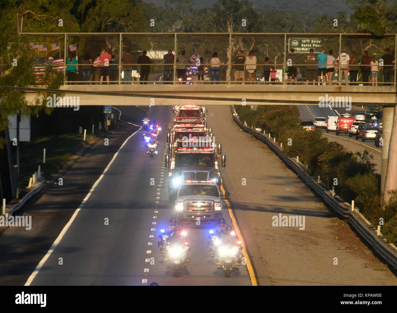A funeral procession by firefighters and police was done as the people ...