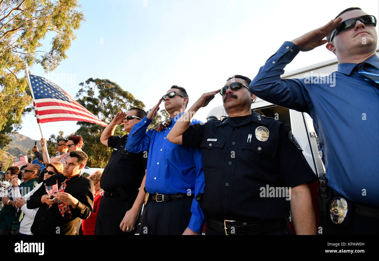 A funeral procession by firefighters and police was done as the people ...