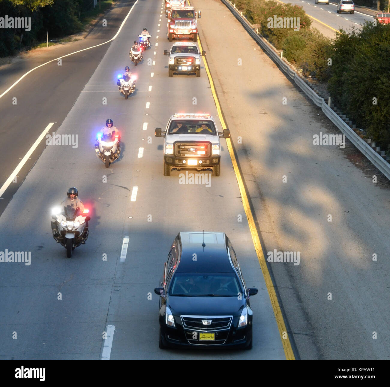 A funeral procession by firefighters and police was done as the people ...