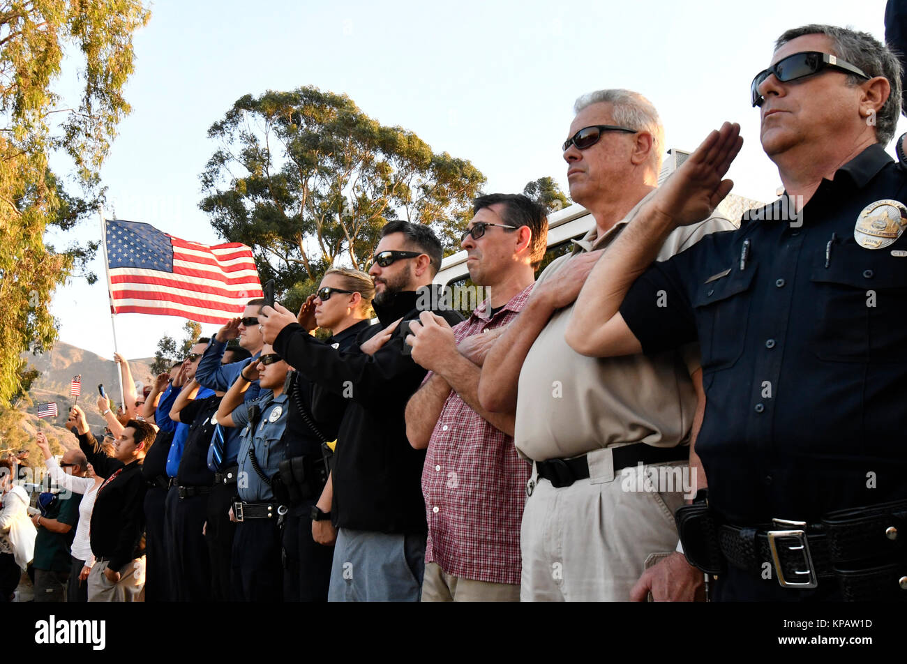 A funeral procession by firefighters and police was done as the people ...