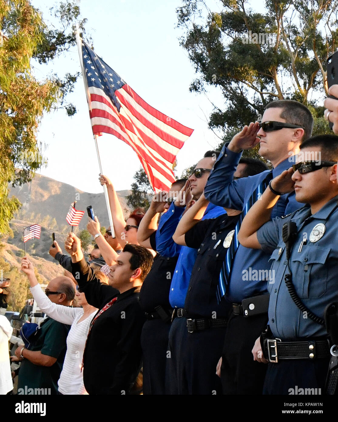A funeral procession by firefighters and police was done as the people ...