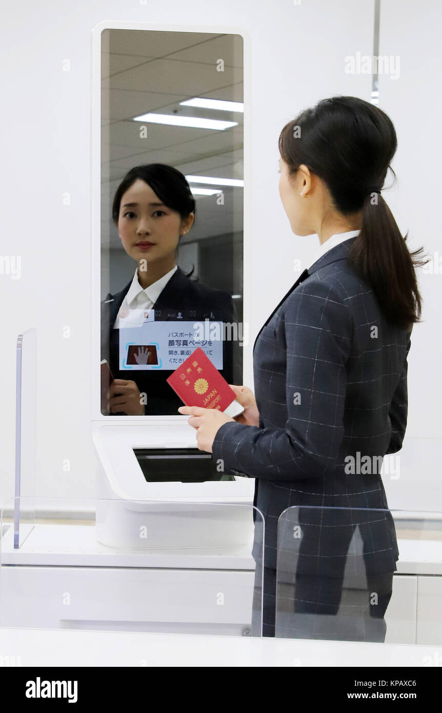 Tokyo, Japan. 15th Dec, 2017. An employee of Japanese electronics giant ...