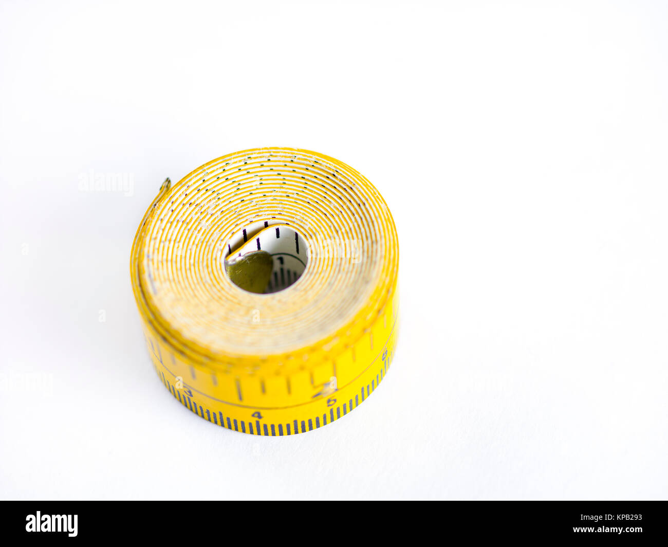 Close Up Rolled Measuring Tape Stock Photo - Alamy