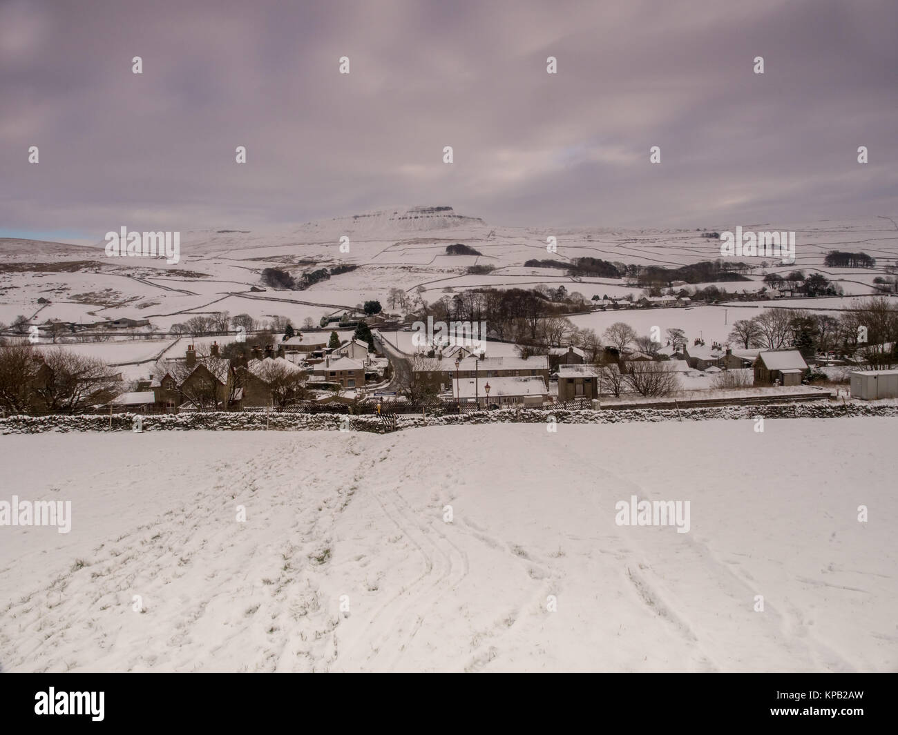 Winter hill walking in the snow on Ingleborough, one of the 3 peaks ...