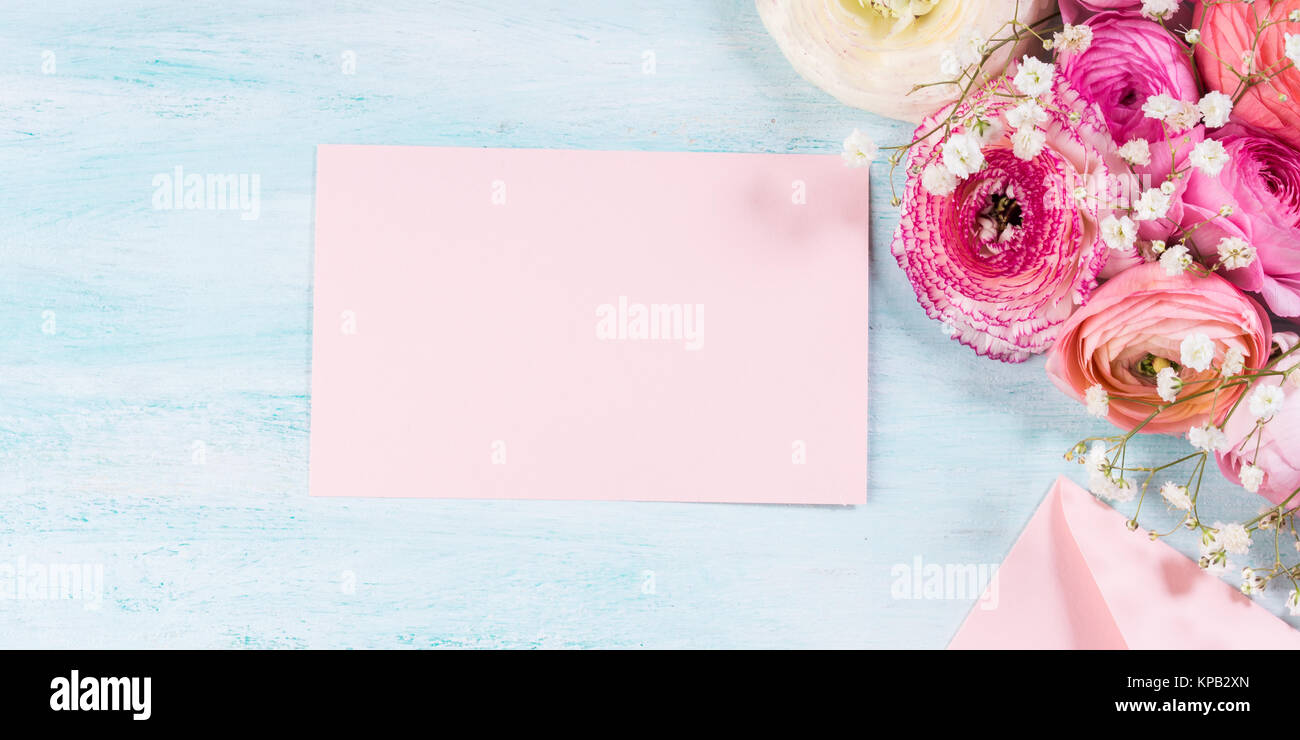 Beautiful buttercup frame on turquoise wooden background. Woman mother ...