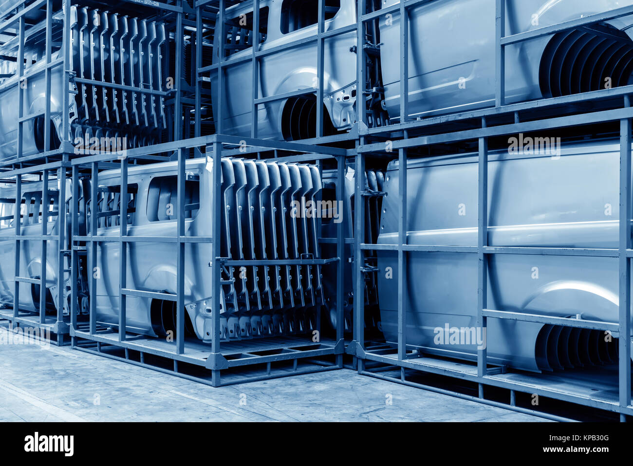 A car factory; neatly arranged exterior components of a car Stock Photo ...