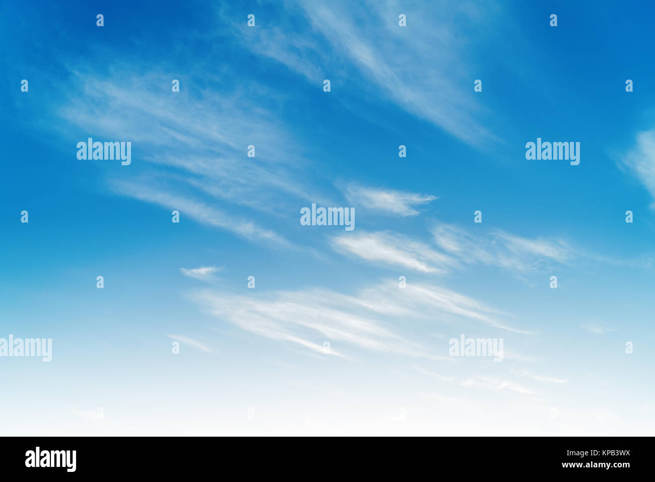 Radial cloud, blue sky and white clouds material Stock Photo - Alamy