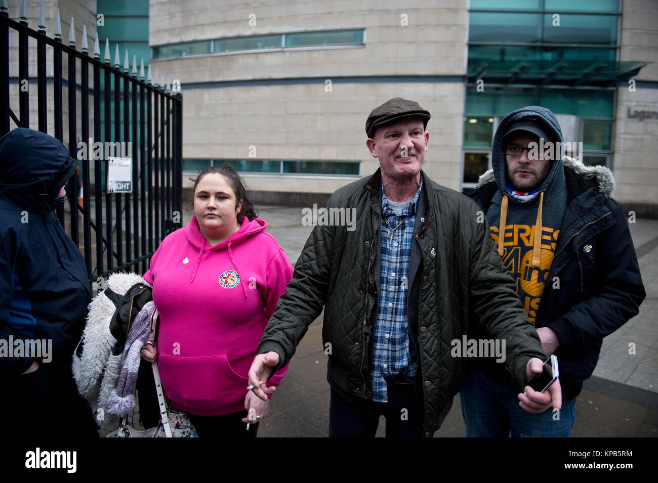 Supporter Andrew Edge (centre right) outside Laganside courts in ...