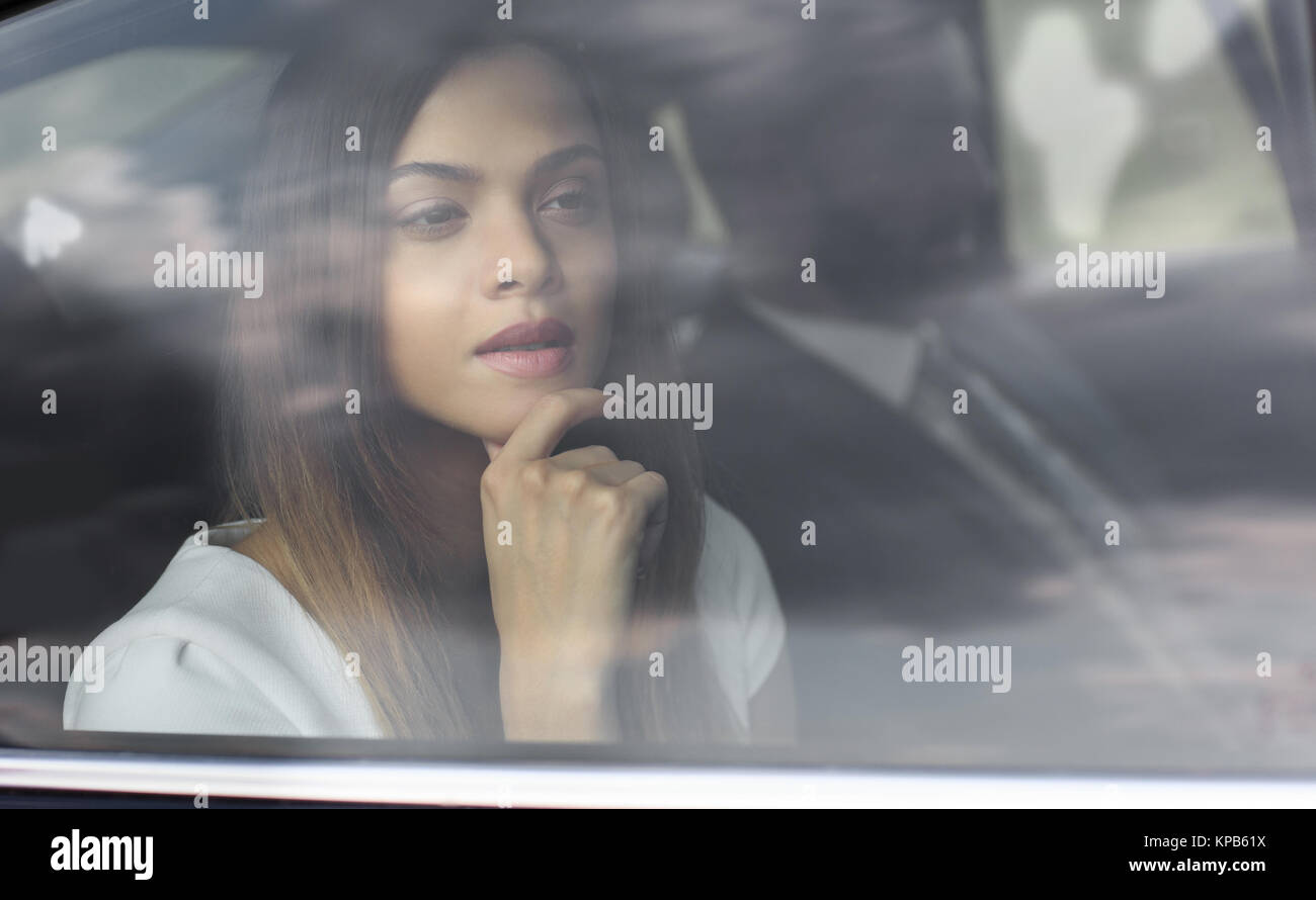 thoughtful business woman sitting in car backseat Stock Photo - Alamy thoughtful business woman sitting in car backseat Stock Photo - Alamy