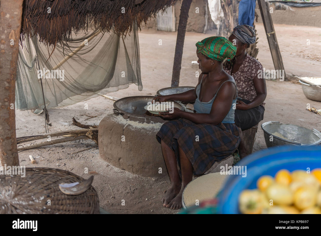 Roasting cassava on a sustainalble energy oven for gari production ...