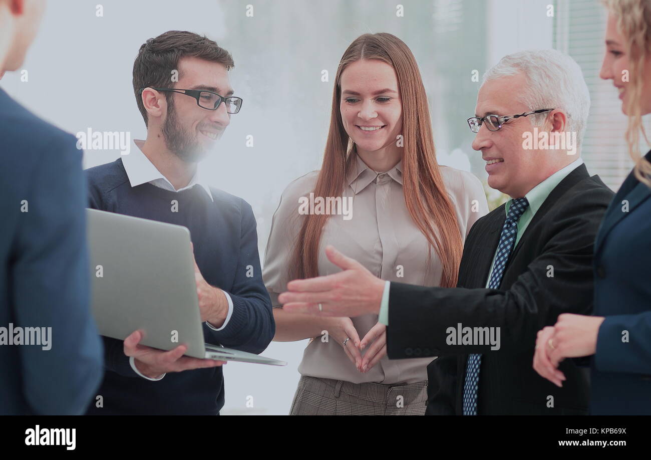 Happy business team planning work together Stock Photo - Alamy