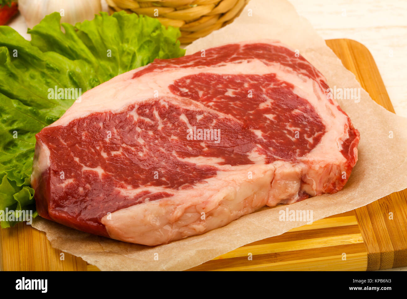 Rib eye raw steak ready for cooking Stock Photo - Alamy