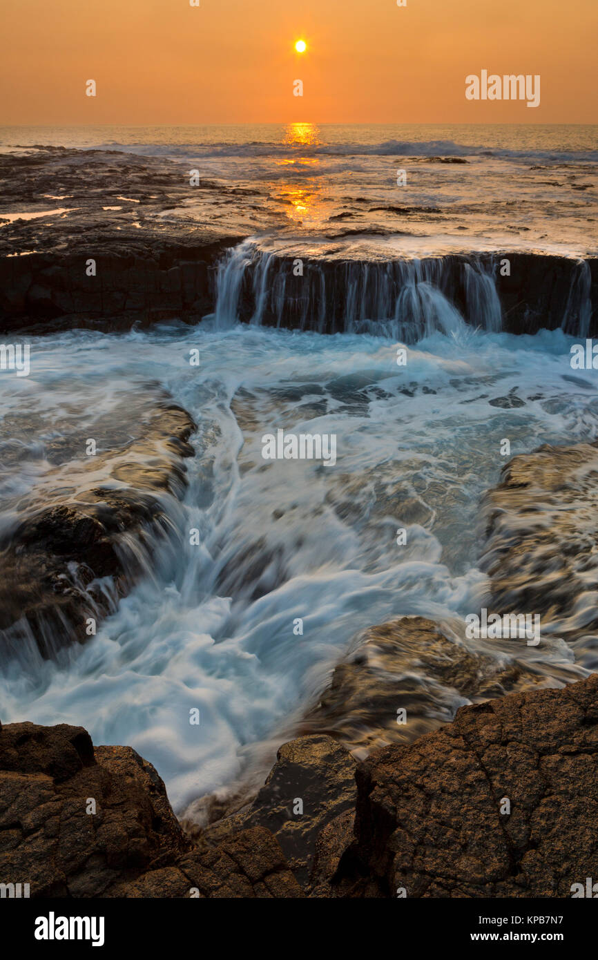 Tidepools flooding and receding along the Kona coast of the Big Island ...